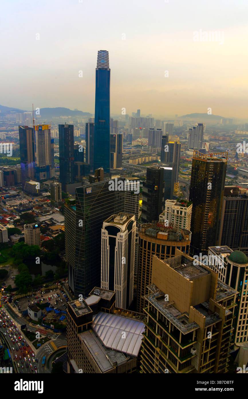 Elevatad view of the Exchange 106 or TRX Signature Tower at sunset ...