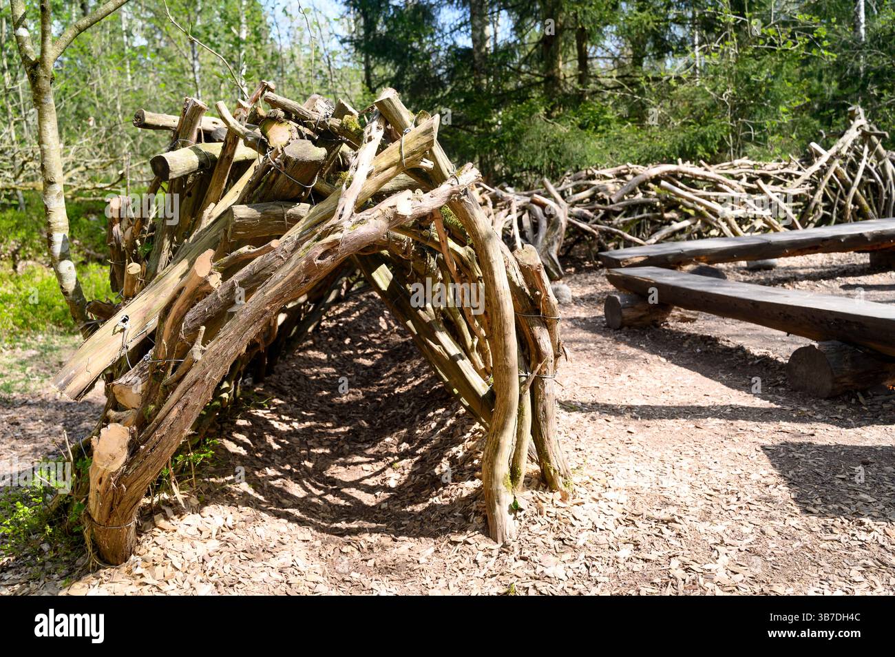 Children's playground made of natural materials in a forest Skrylle ...