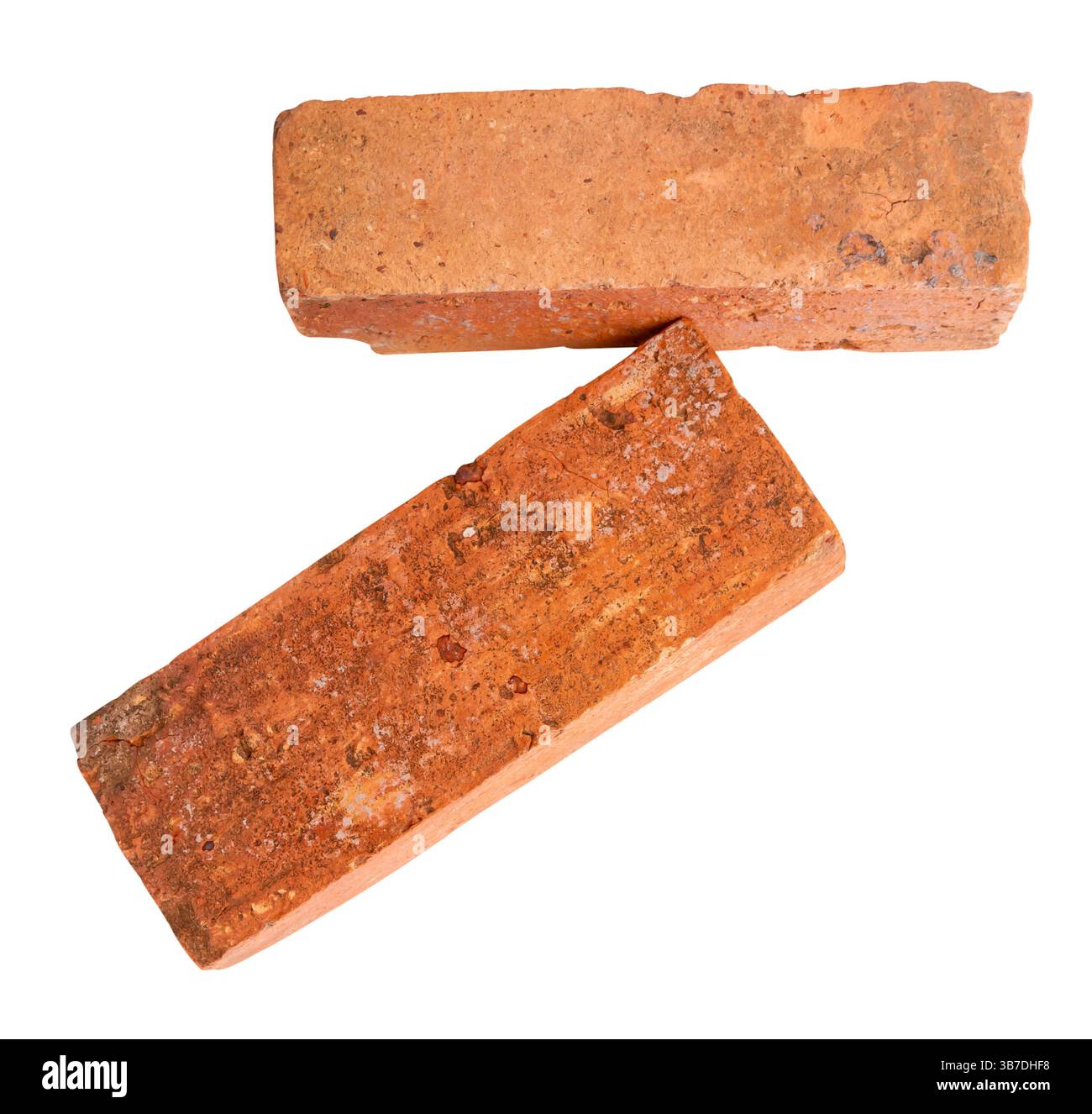 Side view of two old red or orange bricks is isolated on white ...