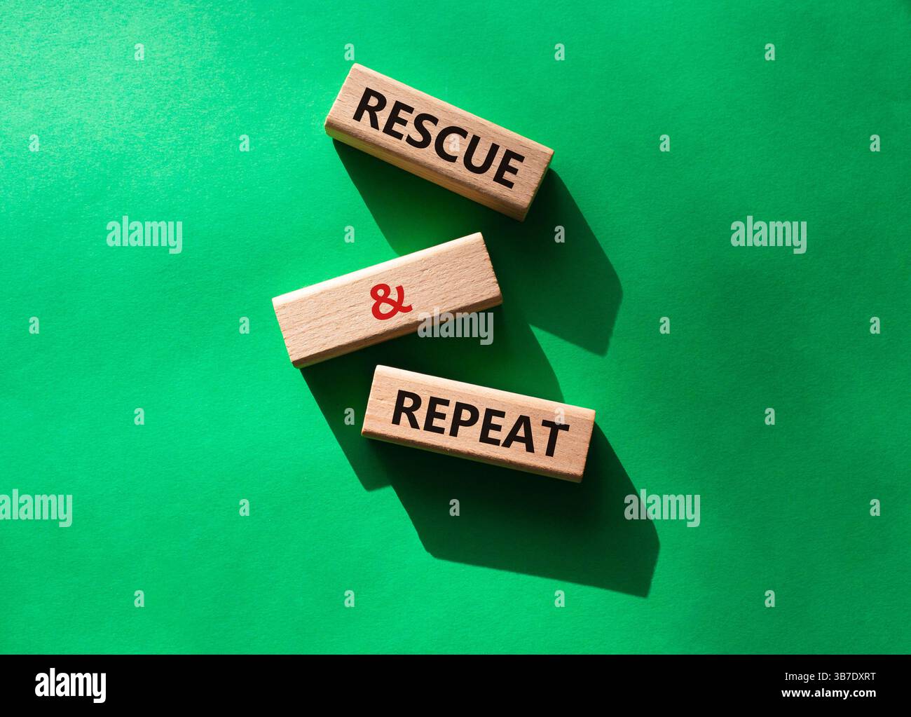 Rescue and Repeat symbol. Wooden blocks with words Rescue and Repeat ...