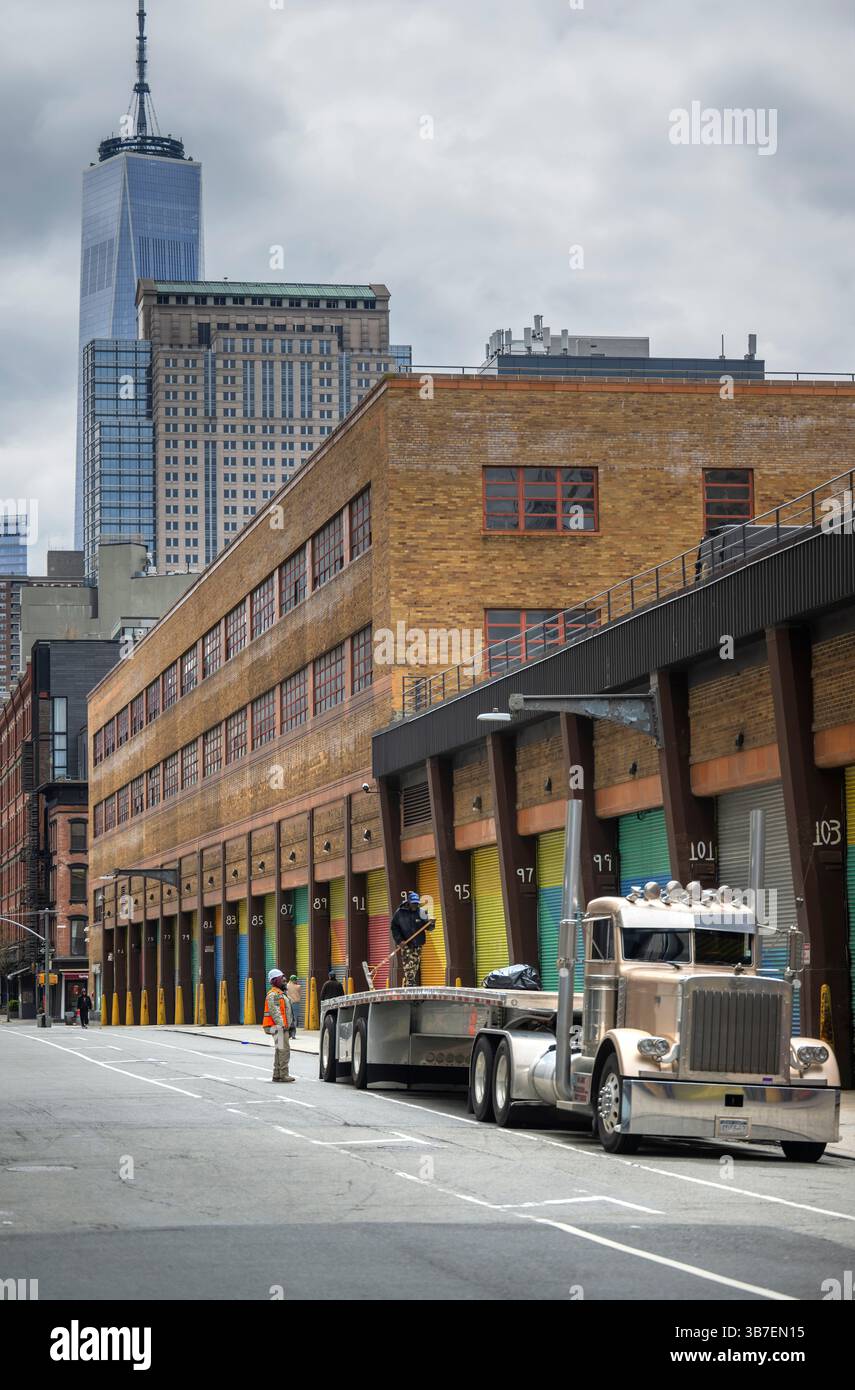 A man cleans a truck outside a UPS depot in Manhattan Stock Photo - Alamy