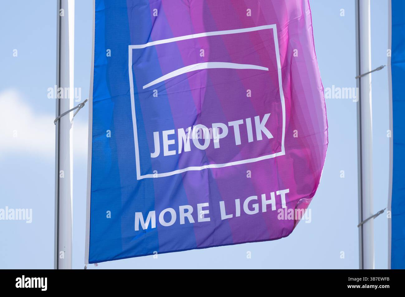 Dresden, Germany. 06th May, 2025. Flags with the logo of the Jenoptik ...