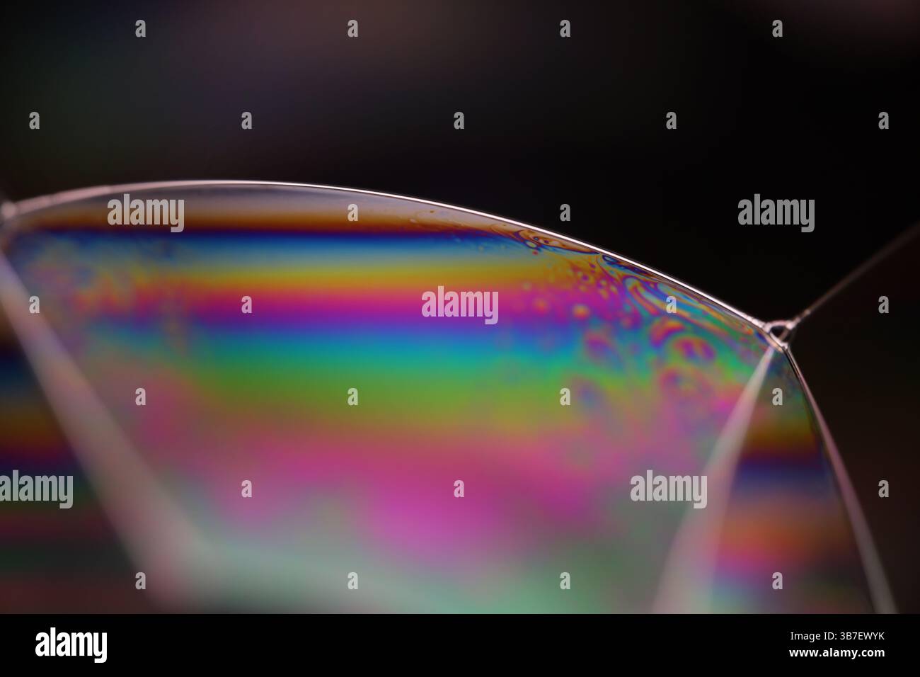 Green liquid surface on dark background, green Reflections of liquid in ...