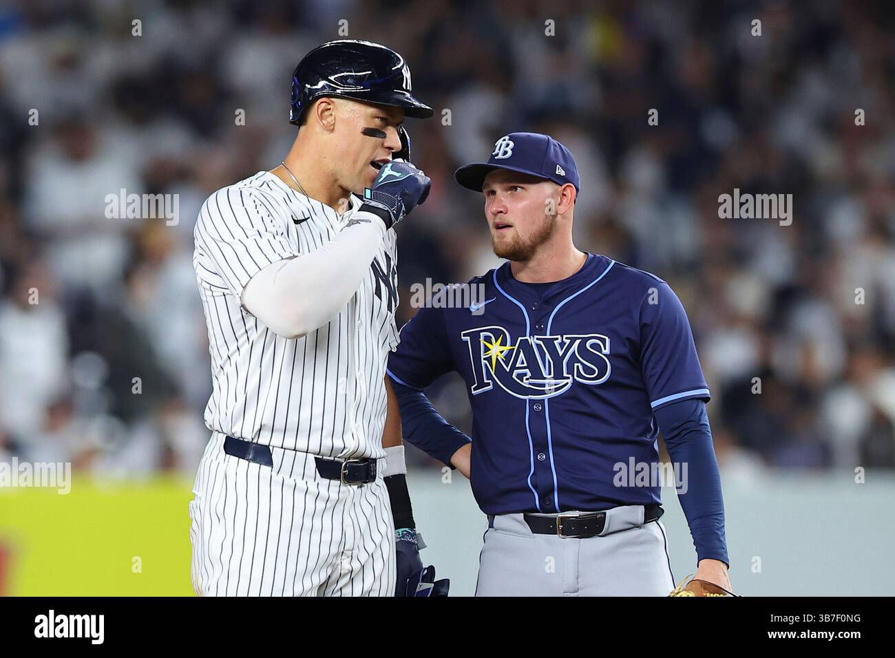 BRONX, NY - MAY 02: Aaron Judge #99 of the New York Yankees talks with ...