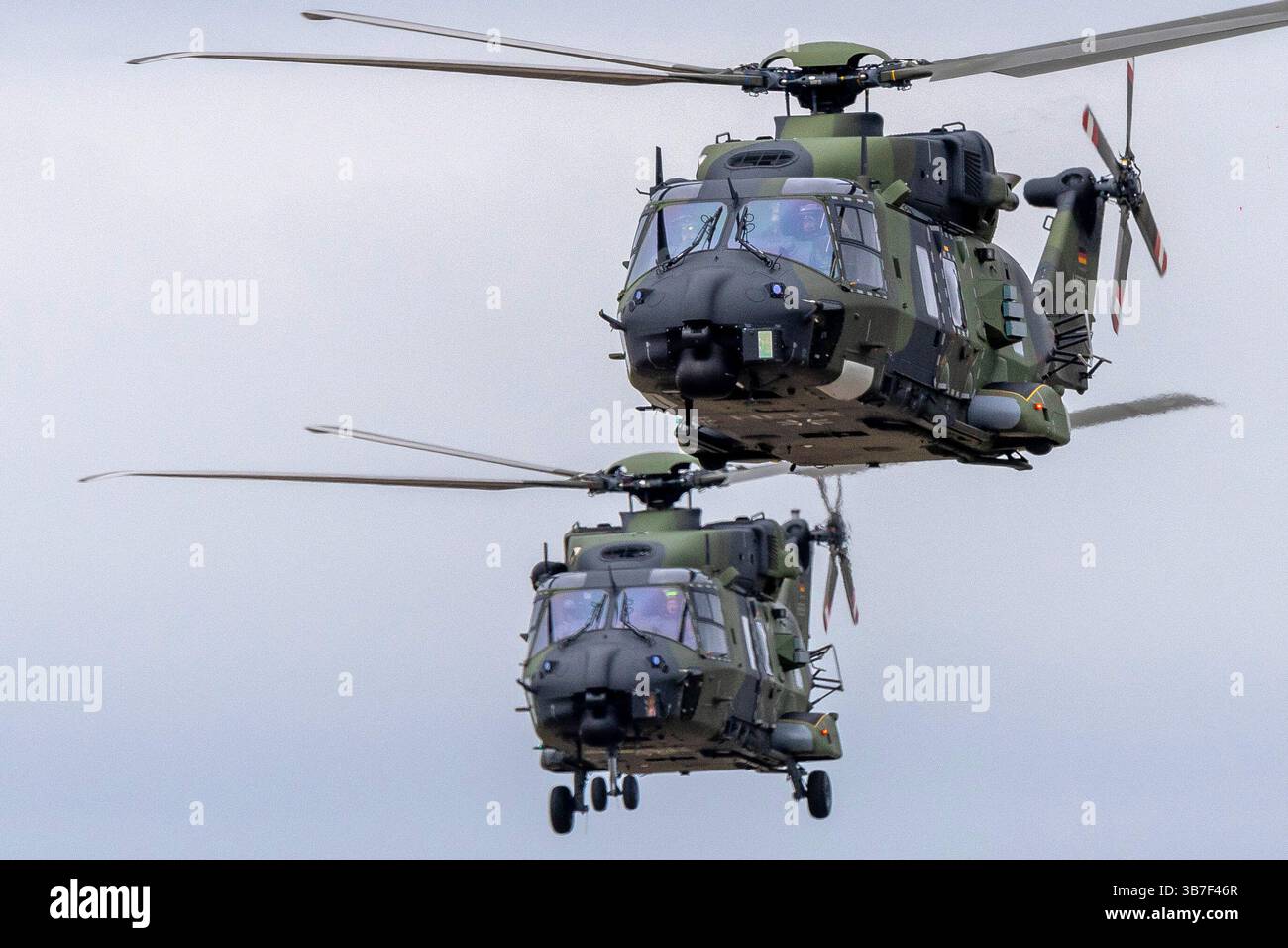 German Air Force NH90 transport helicopters fly during a NATO military ...