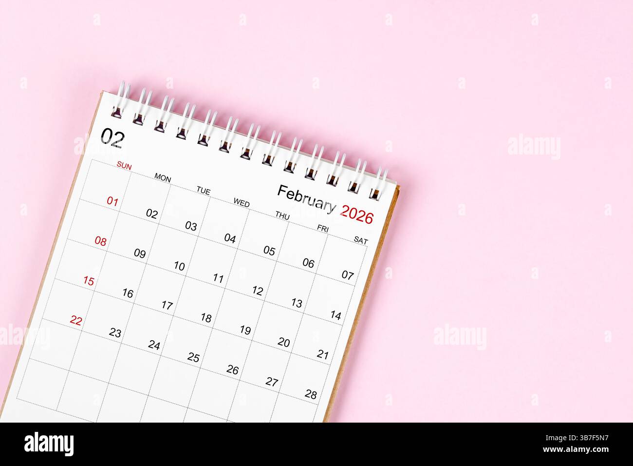 February 2026 desk calendar on pink color background, Position with ...