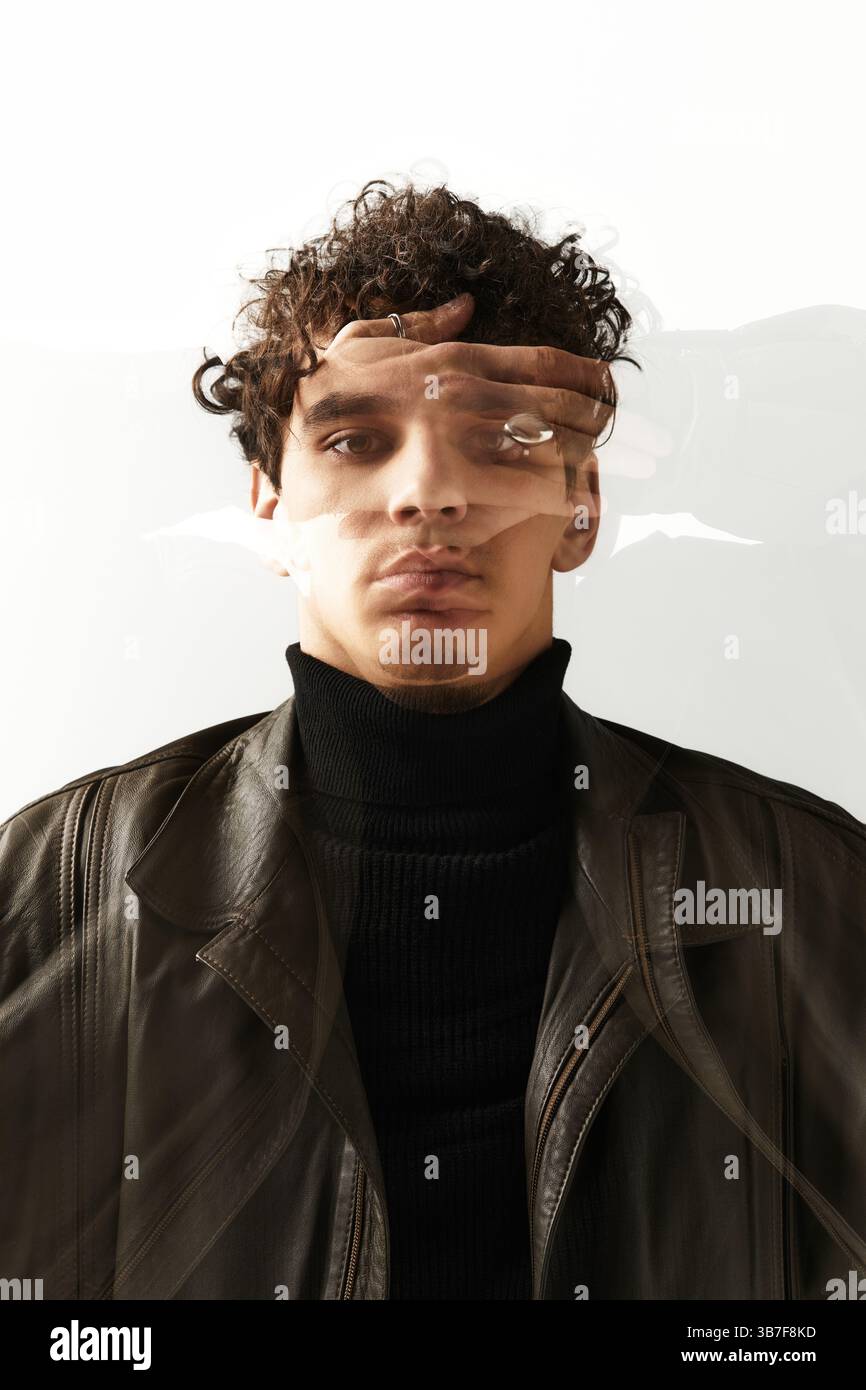 A handsome young man showcases his unique style with an artistic twist ...