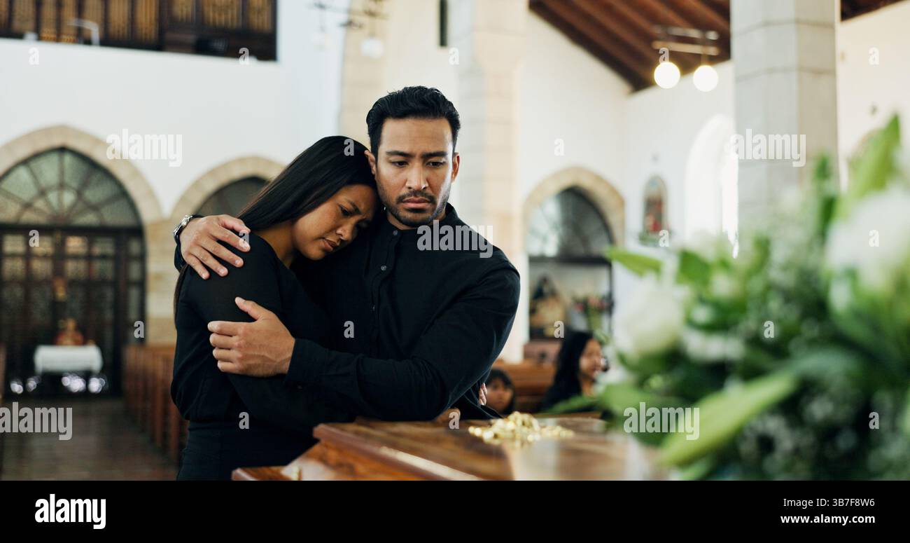 Coffin, comfort and couple mourning at funeral in church for respect ...
