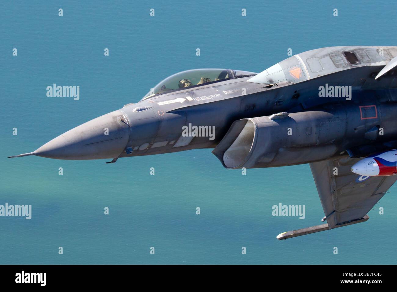 Equipped with conformal fuel tanks, the F-16 Fighting Falcon in the ...