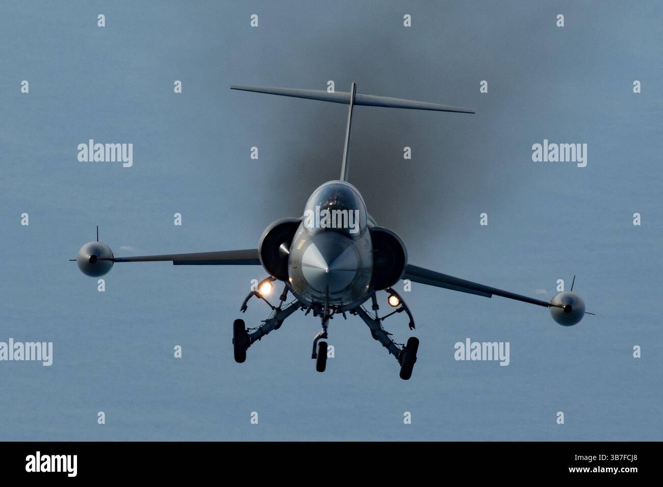 The Canadair CF-104D Starfighter, with landing gear down, is a ...
