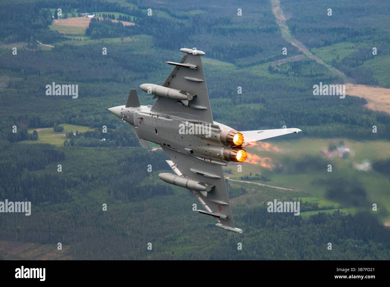 The Italian Air Force Eurofighter Typhoon EF2000 performs a banking ...