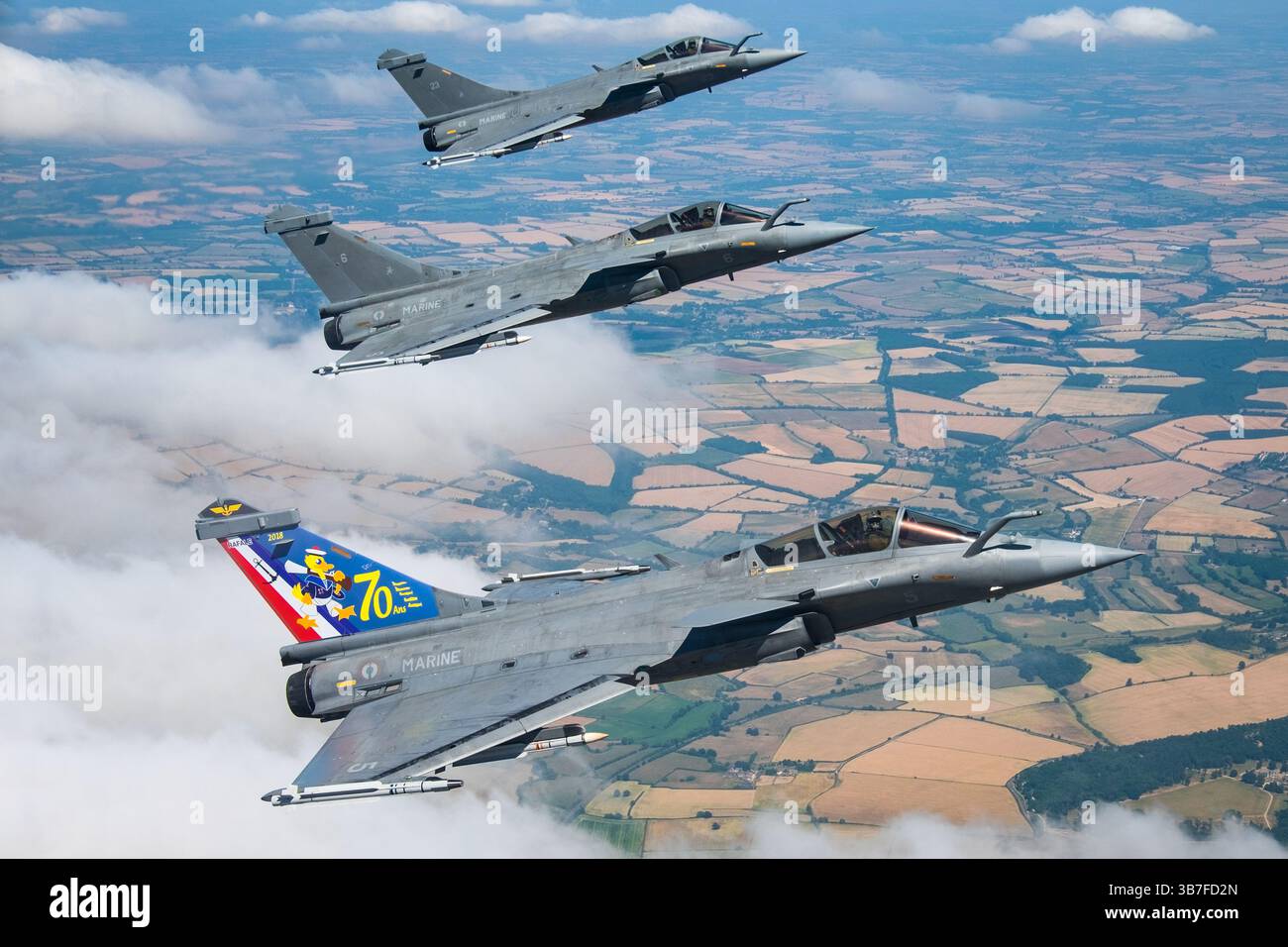 This photo captures three Dassault Rafale M aircraft of the French Navy ...