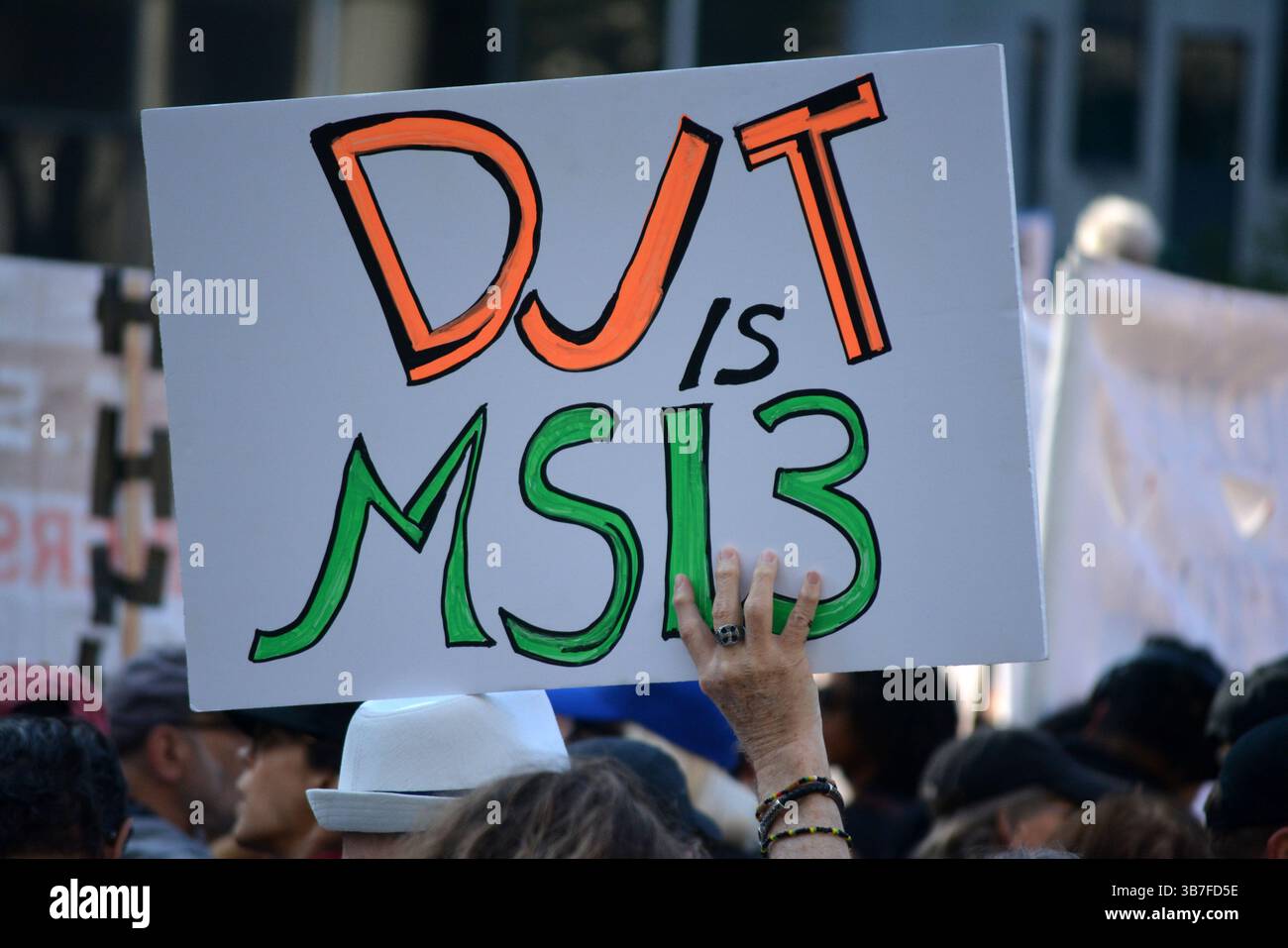 May Day demonstration supporting workers' rights and against the Trump ...
