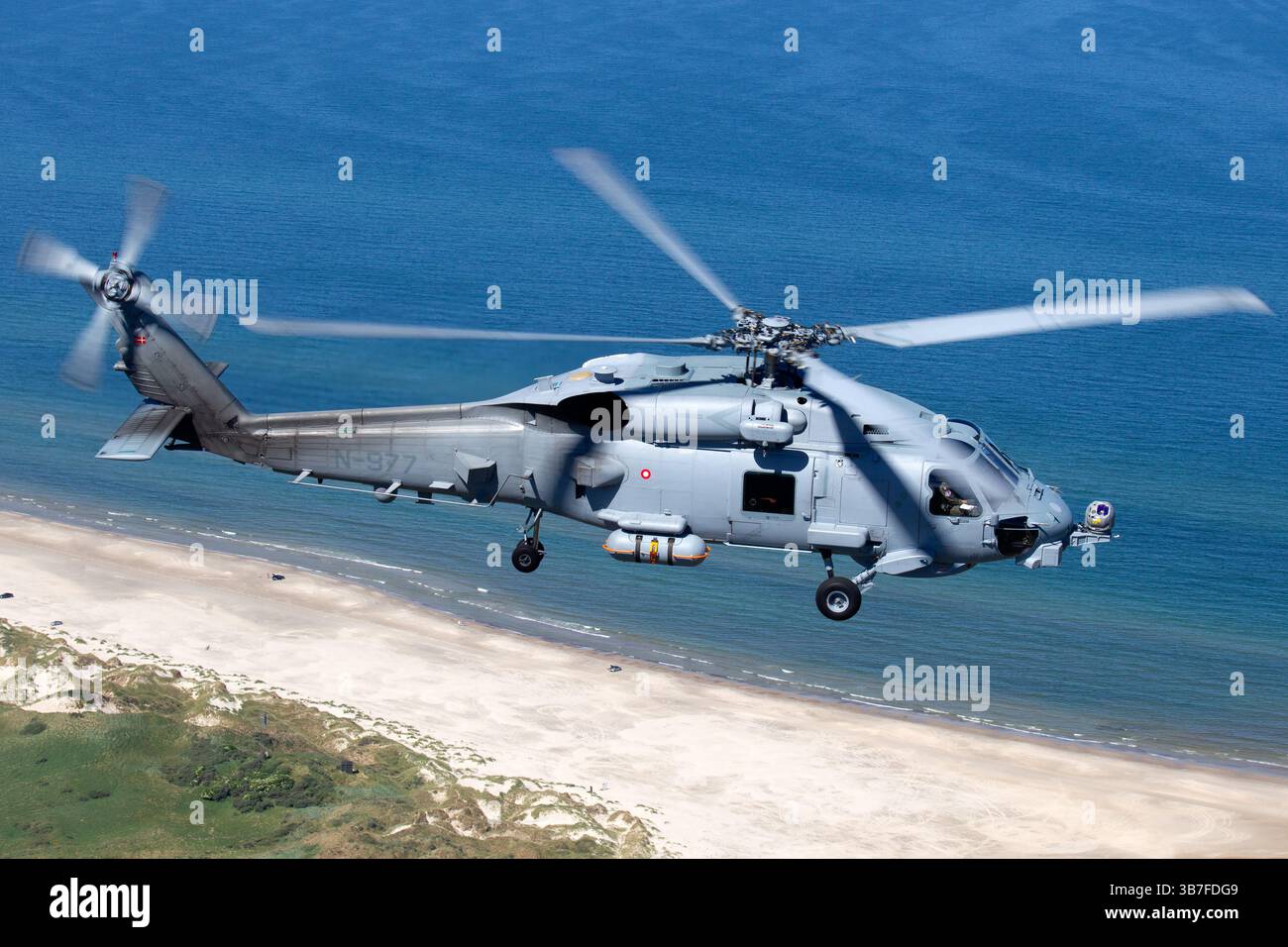 The Sikorsky MH-60R Seahawk, with registration N-977, is an advanced ...