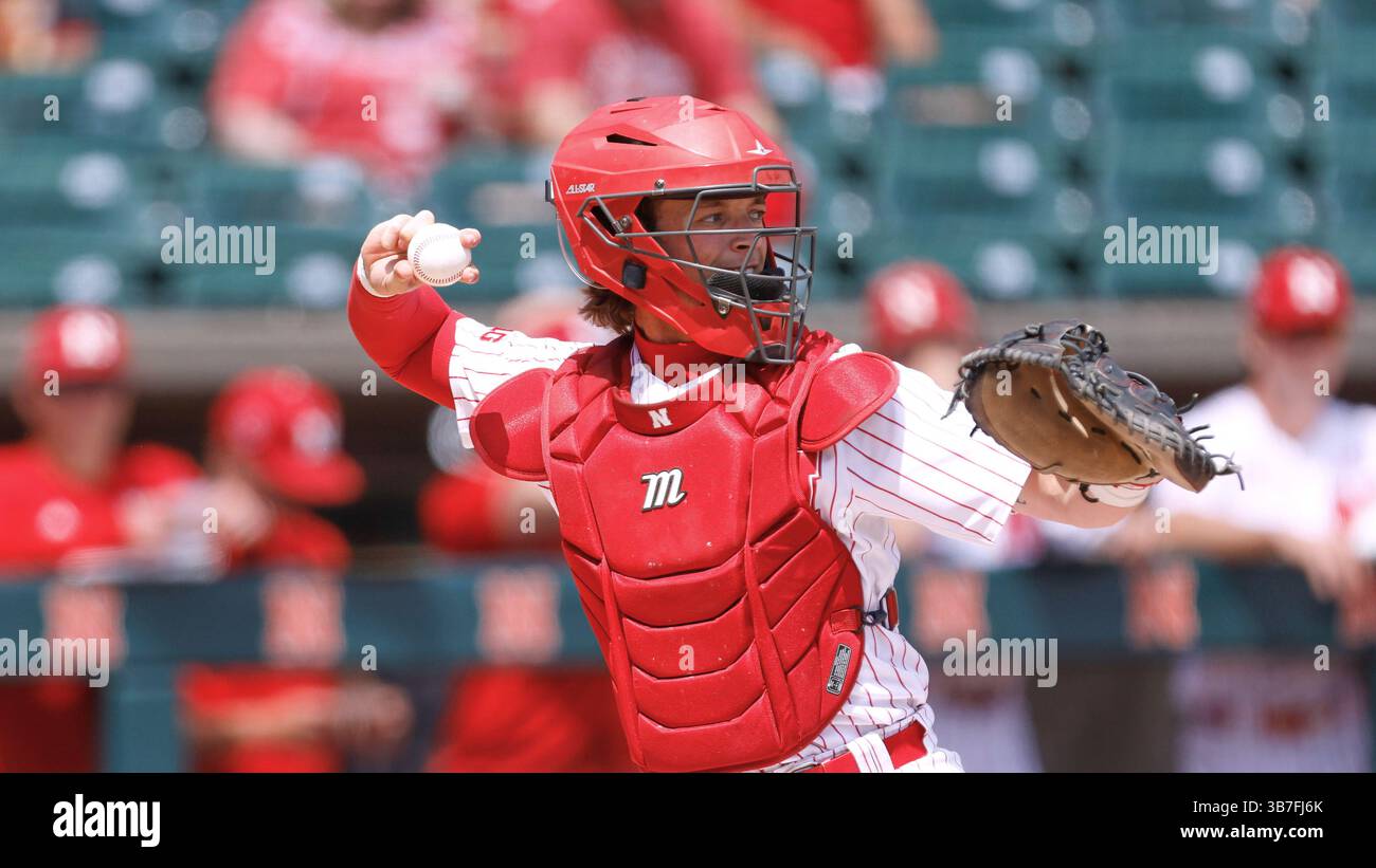 Nebraska catcher Hogan Helligso (10) during an NCAA baseball game ...