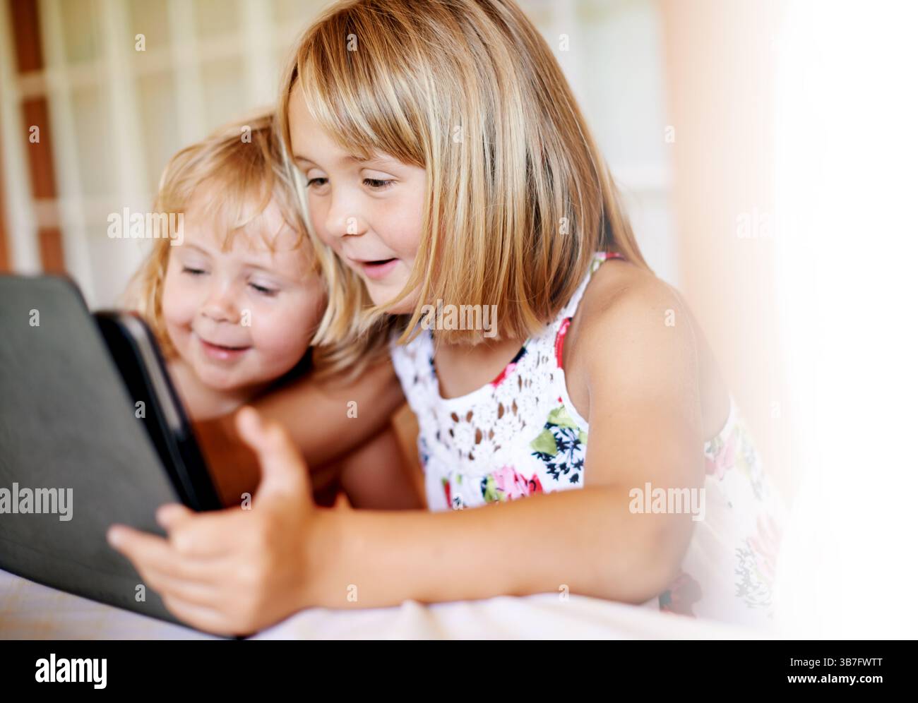 Girls, house and kids on tablet for streaming online for movies ...