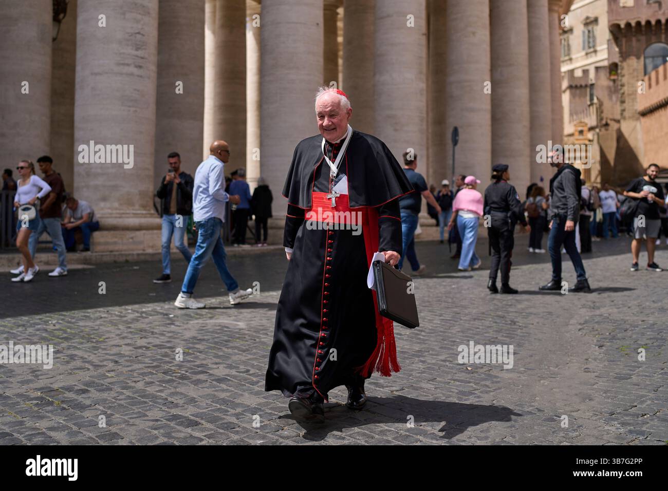 Cardinal Marc Ouellet walks outside the Vatican, Tuesday, May 6, 2025 ...
