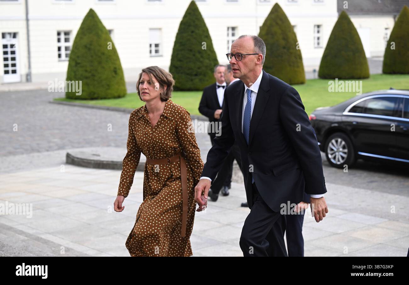 Chancellor-designate Friedrich Merz, right, is welcomed by Head of the ...