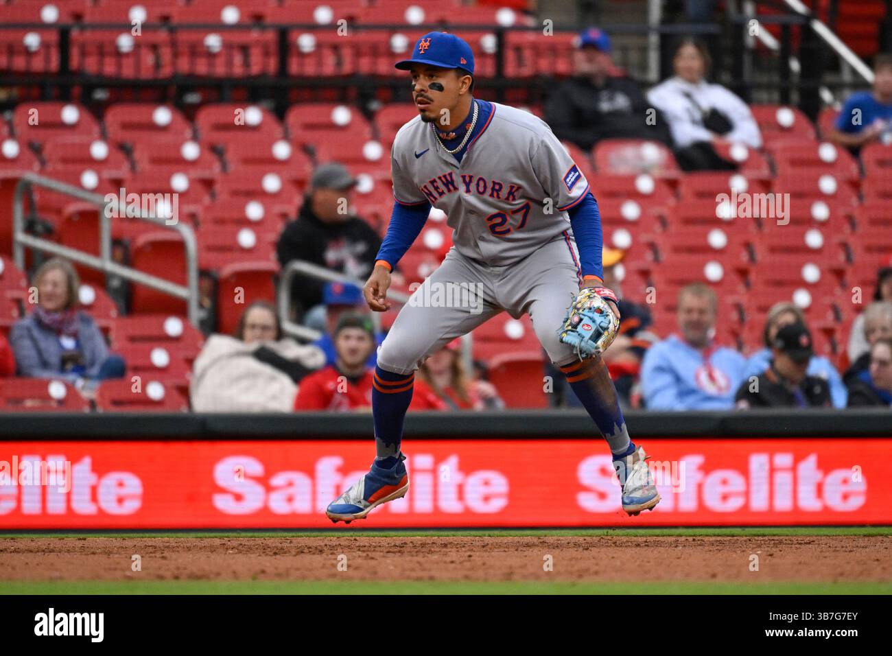 New York Mets third baseman Mark Vientos takes up his position in the ...