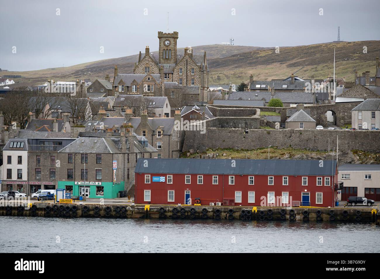 Lerwick Town Hall sits high above the town centre and its harbour and ...