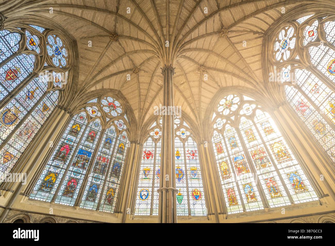 A view captures the intricate stained glass windows and ornate ceiling ...