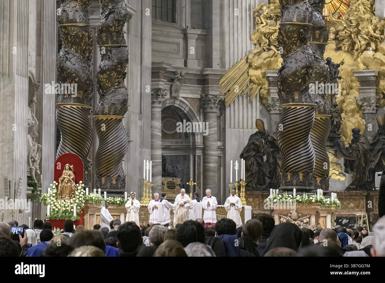 Saint Father Pope Francis prays in St Peter's Basilica under Bernini's ...