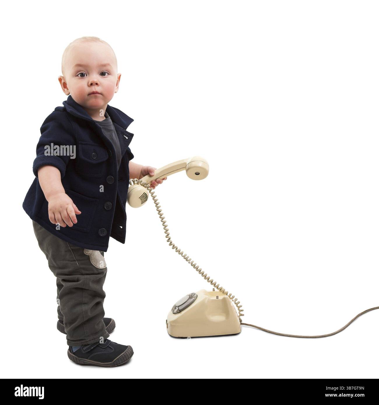 Funny boy with old phone Stock Photo - Alamy
