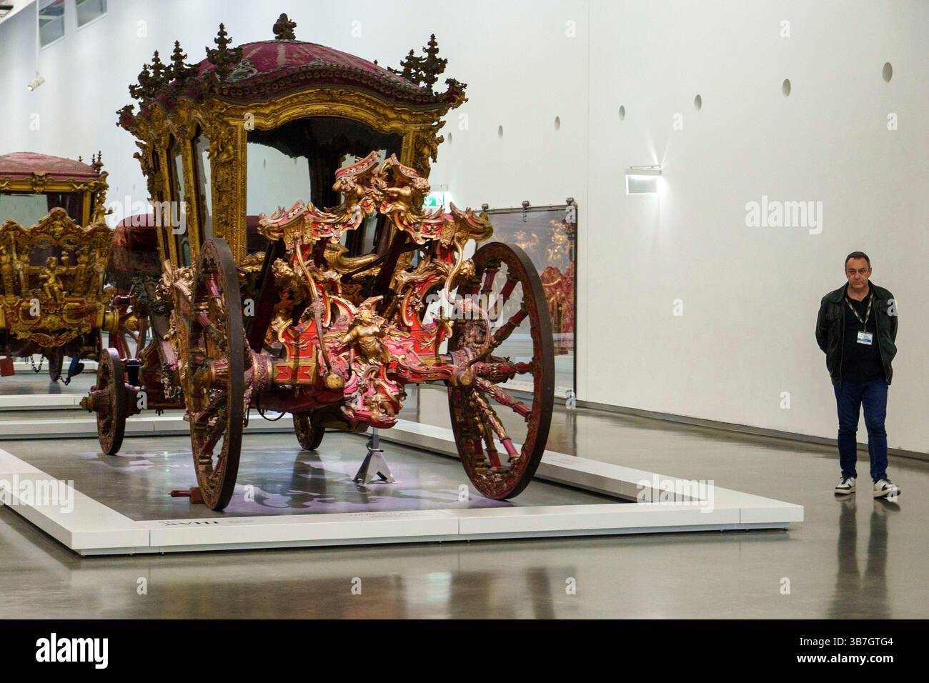 Ornate antique horse-drawn carriage displayed in the National Coach ...