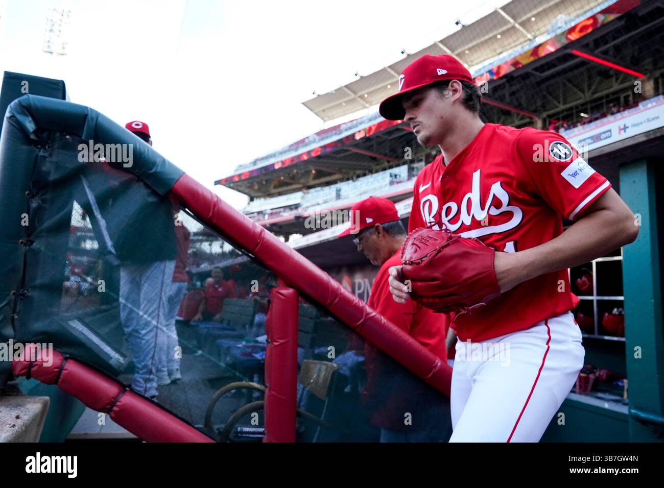 Cincinnati Reds pitcher Chase Petty leaves the dugout during the second ...