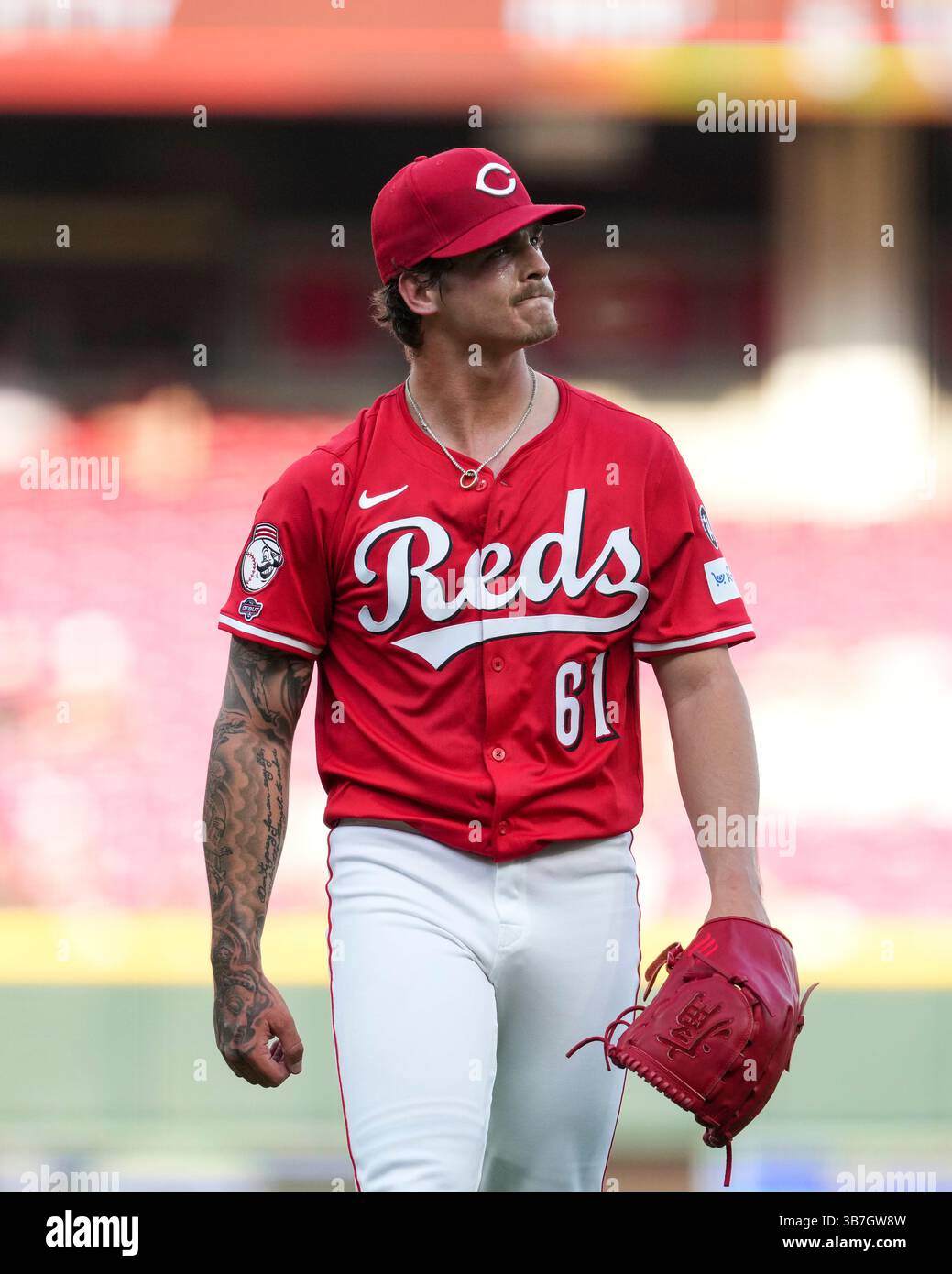 Cincinnati Reds pitcher Chase Petty walks to the dugout during the ...
