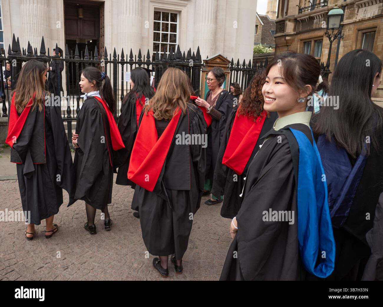 Cambridge University Graduation Day on 3 May 2025. Students queue along ...