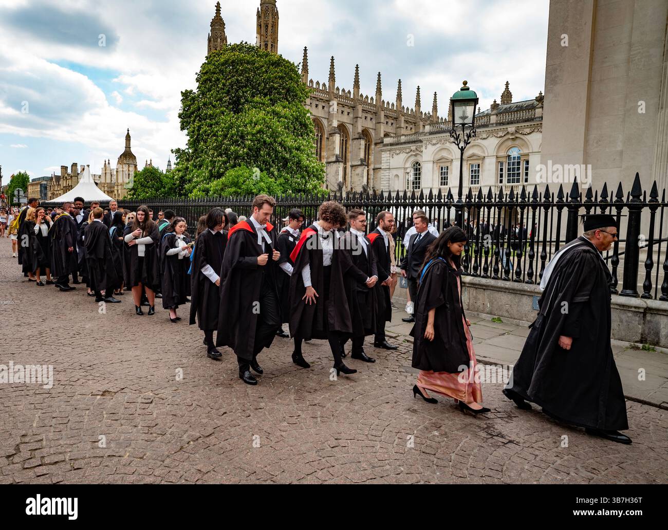 Cambridge University Graduation Day on 3 May 2025. Students queue along ...