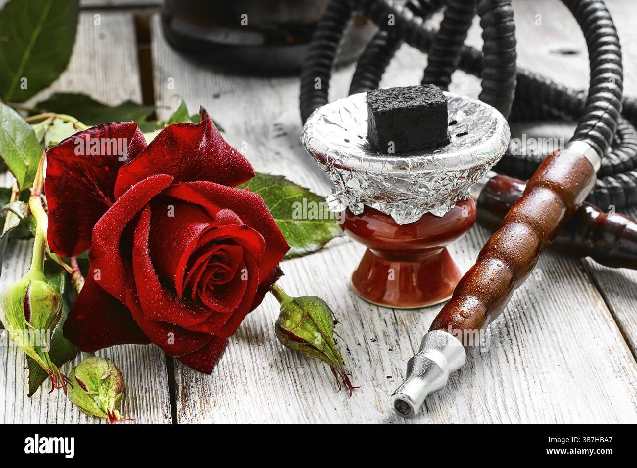 Smoking Turkish hookah filled with tobacco with the taste of roses ...