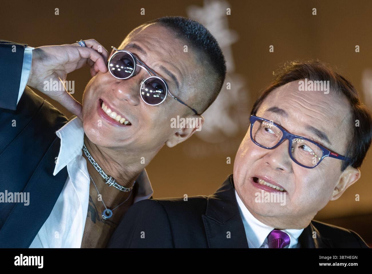 Actor Tommy Chu Pak Hong and Michael Hui poses on the red carpet during ...