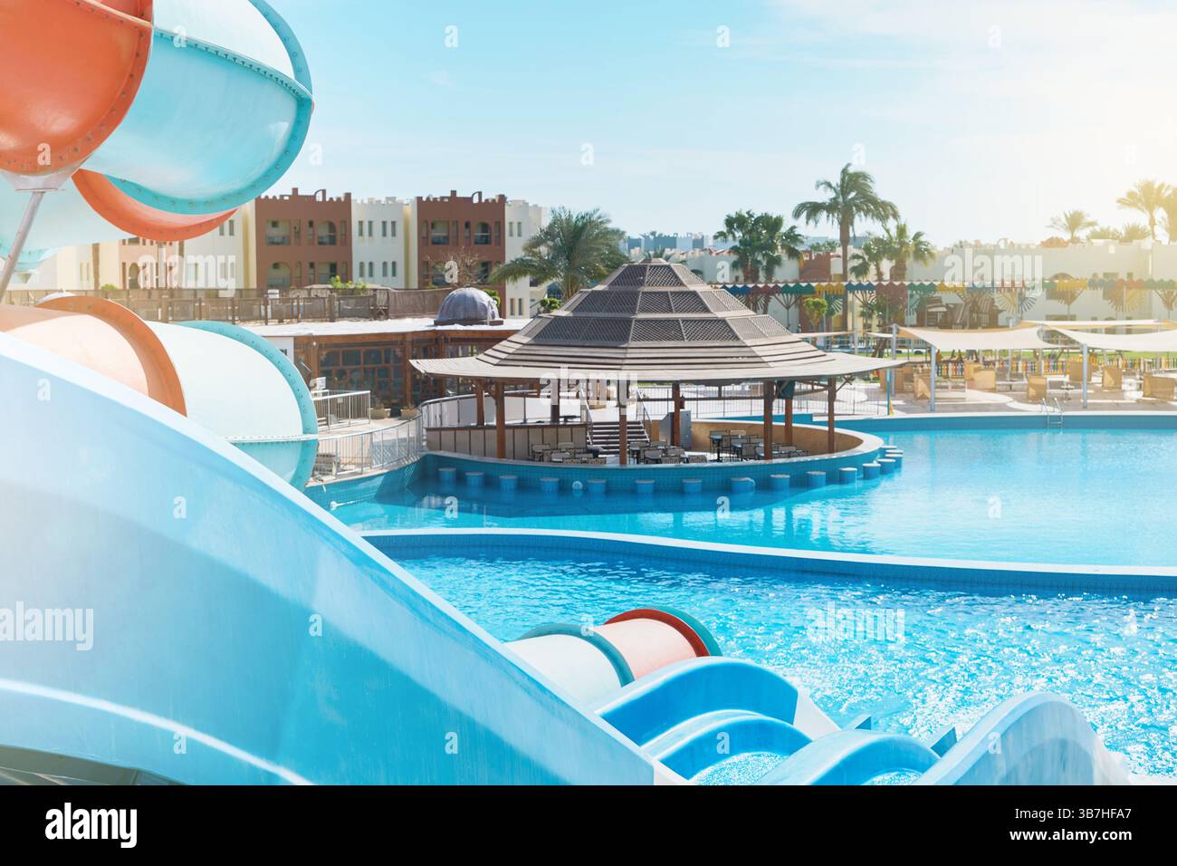 Water park with water colored flights, slides, splashes and pools at ...