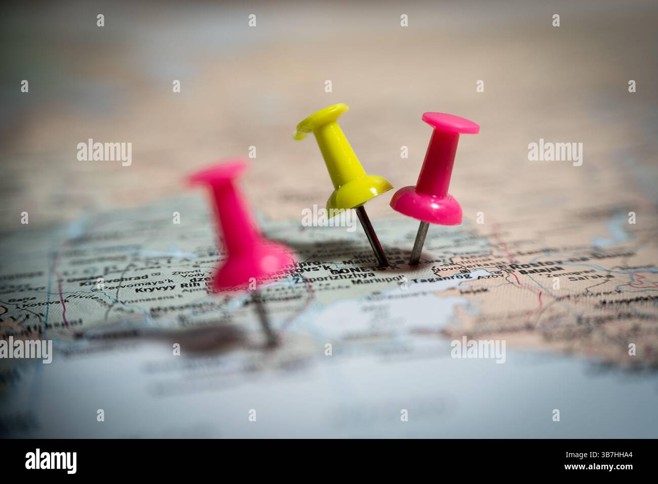 Colorful push pins marking locations on map of ukraine Stock Photo - Alamy