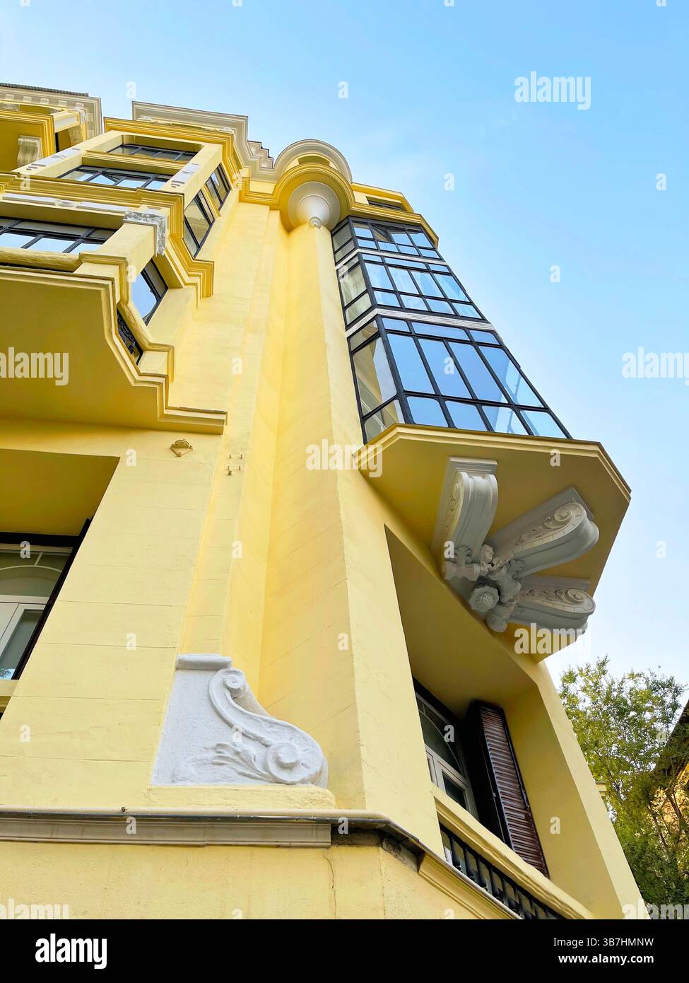 Facade of Art-Nouveau building, view from below. Principe de Vergara ...
