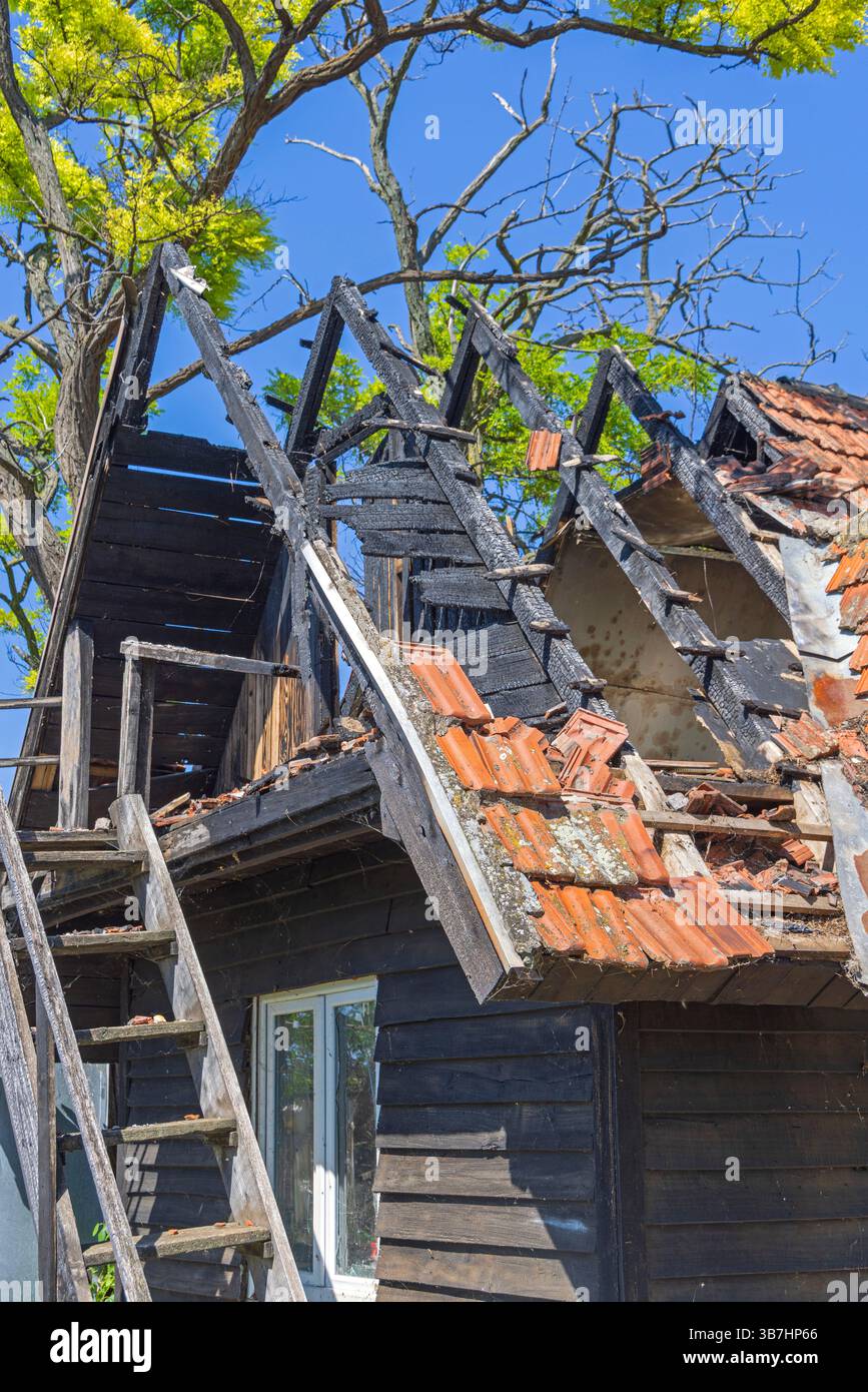 Burnt Attic Structure Fire Damage at Small Cabin House Top Stock Photo ...