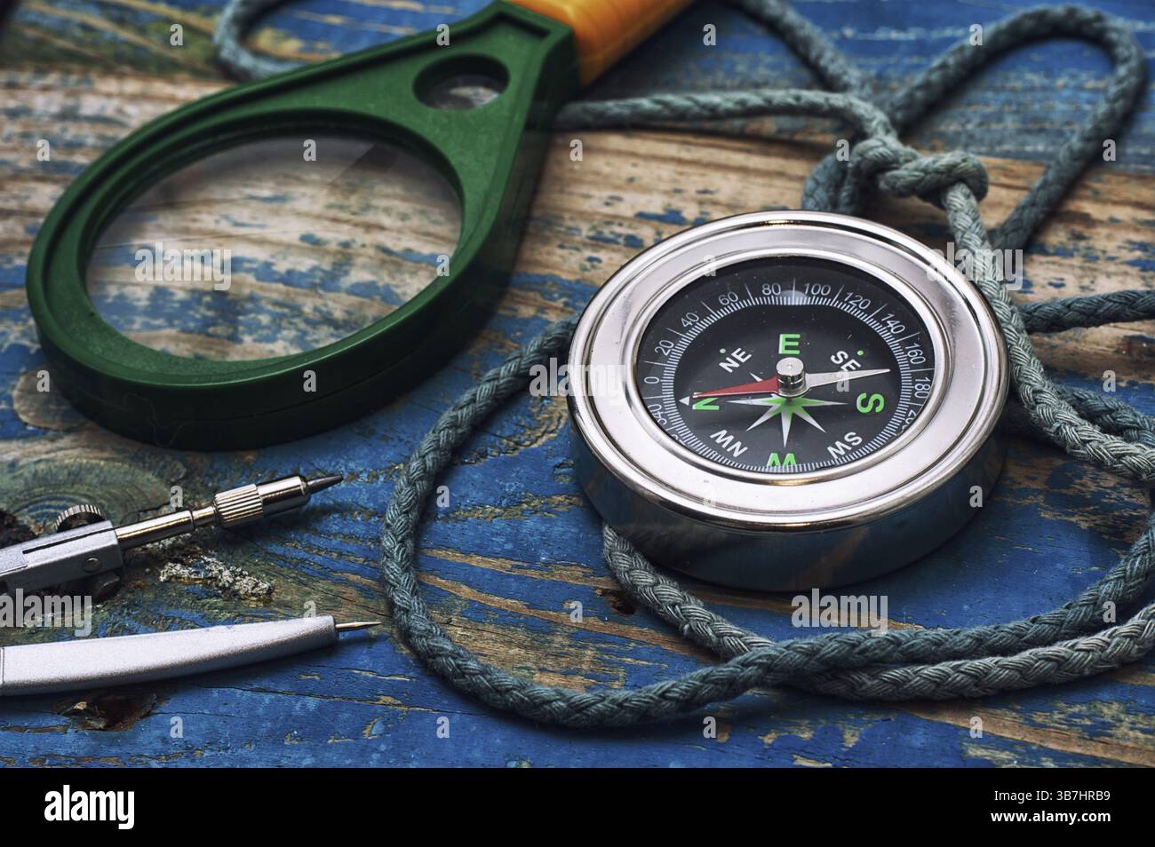Compass, map of the main tourist instruments Stock Photo - Alamy