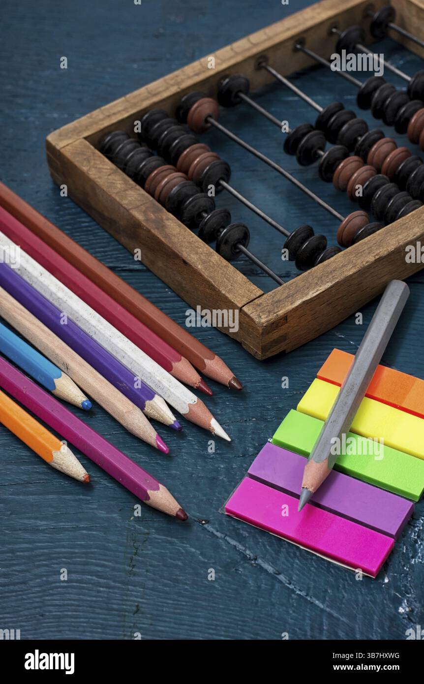 Pen and notebook tool a first grader to school Stock Photo - Alamy