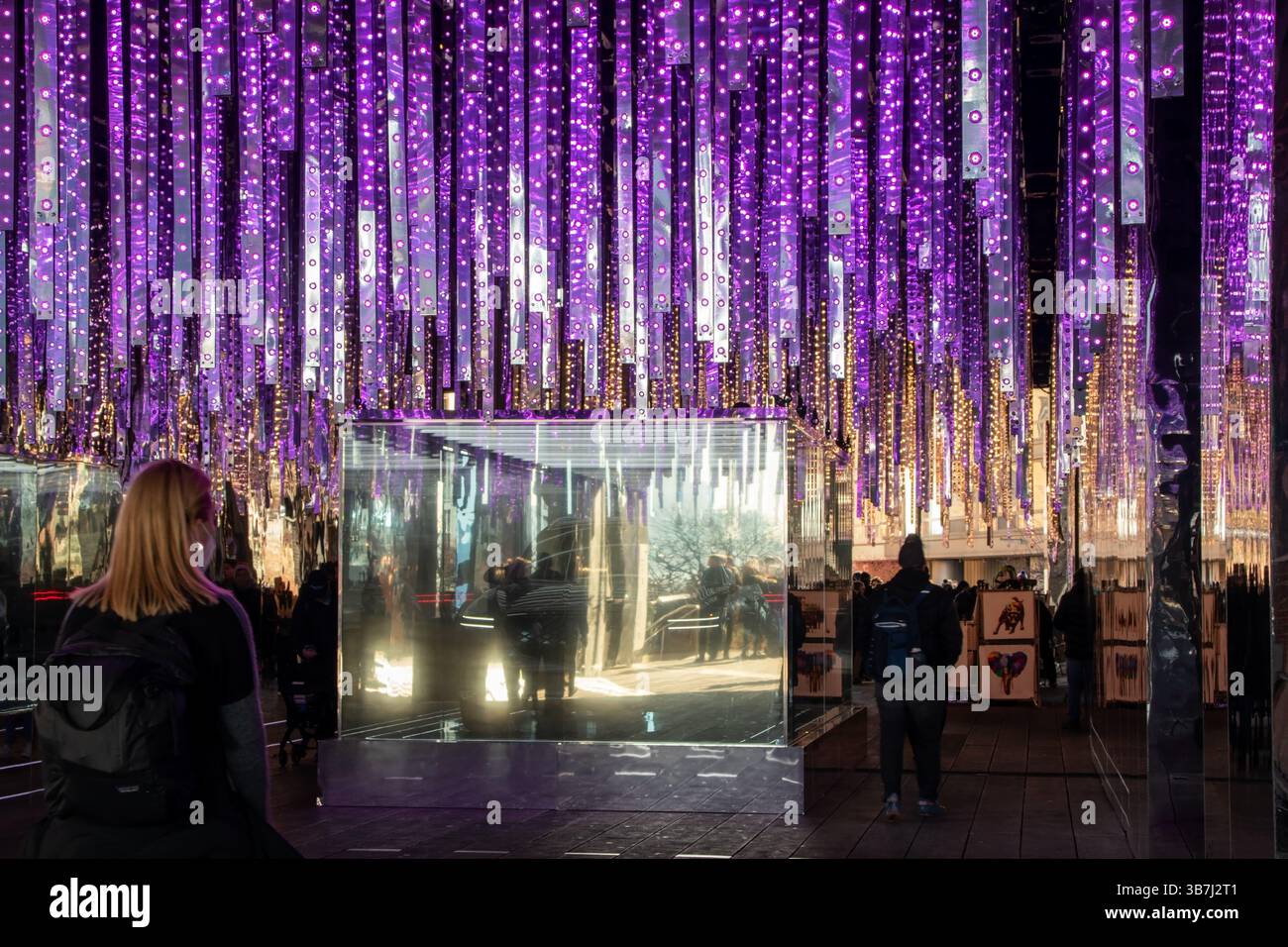 People take pictures of outdoor light display in Manhattan NYC park ...