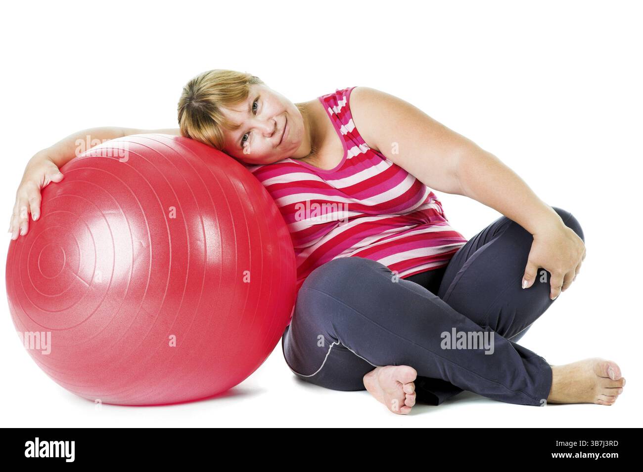 Fat woman with big red gimnastic ball Stock Photo - Alamy