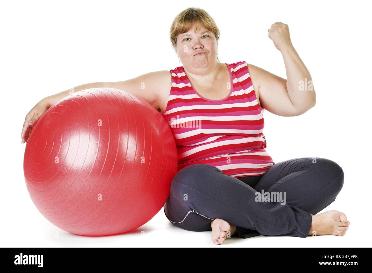 Fat woman with big red gimnastic ball Stock Photo - Alamy