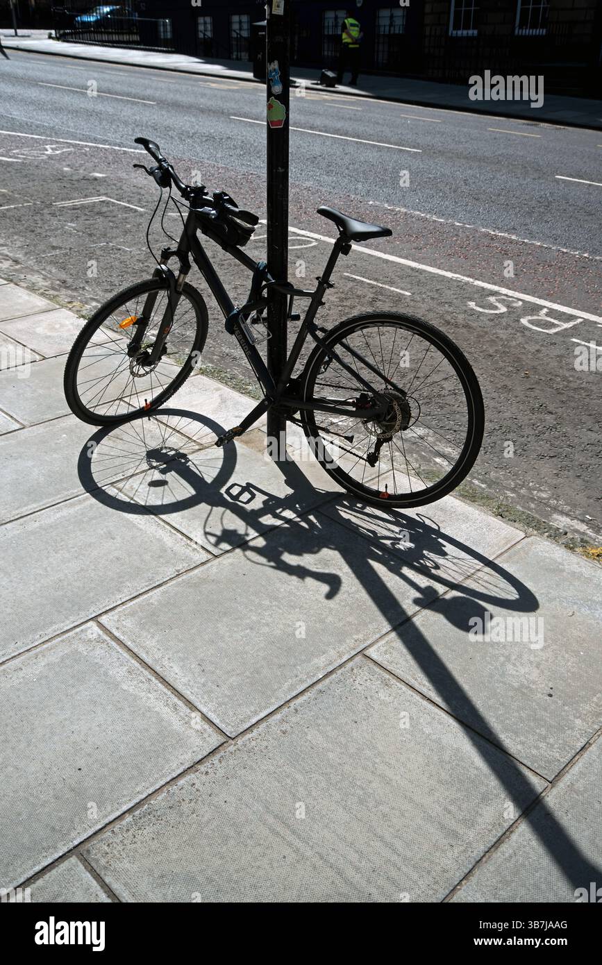 Bike casts a long shadow hi-res stock photography and images - Alamy