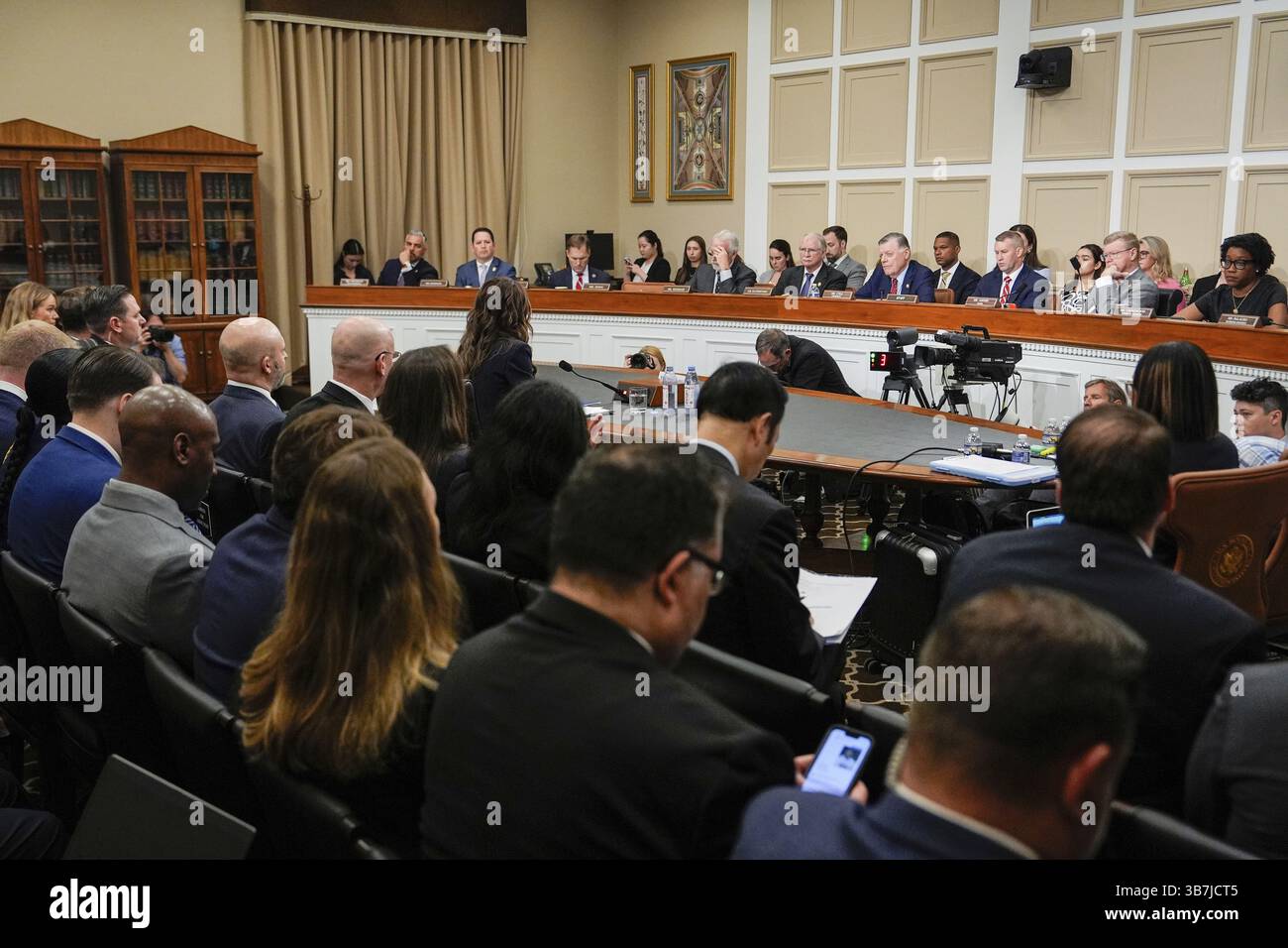 Homeland Security Secretary Kristi Noem listens to members speak during ...