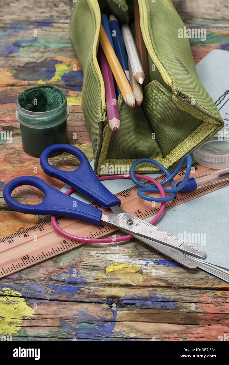 Pen and notebook tool a first grader to school Stock Photo - Alamy