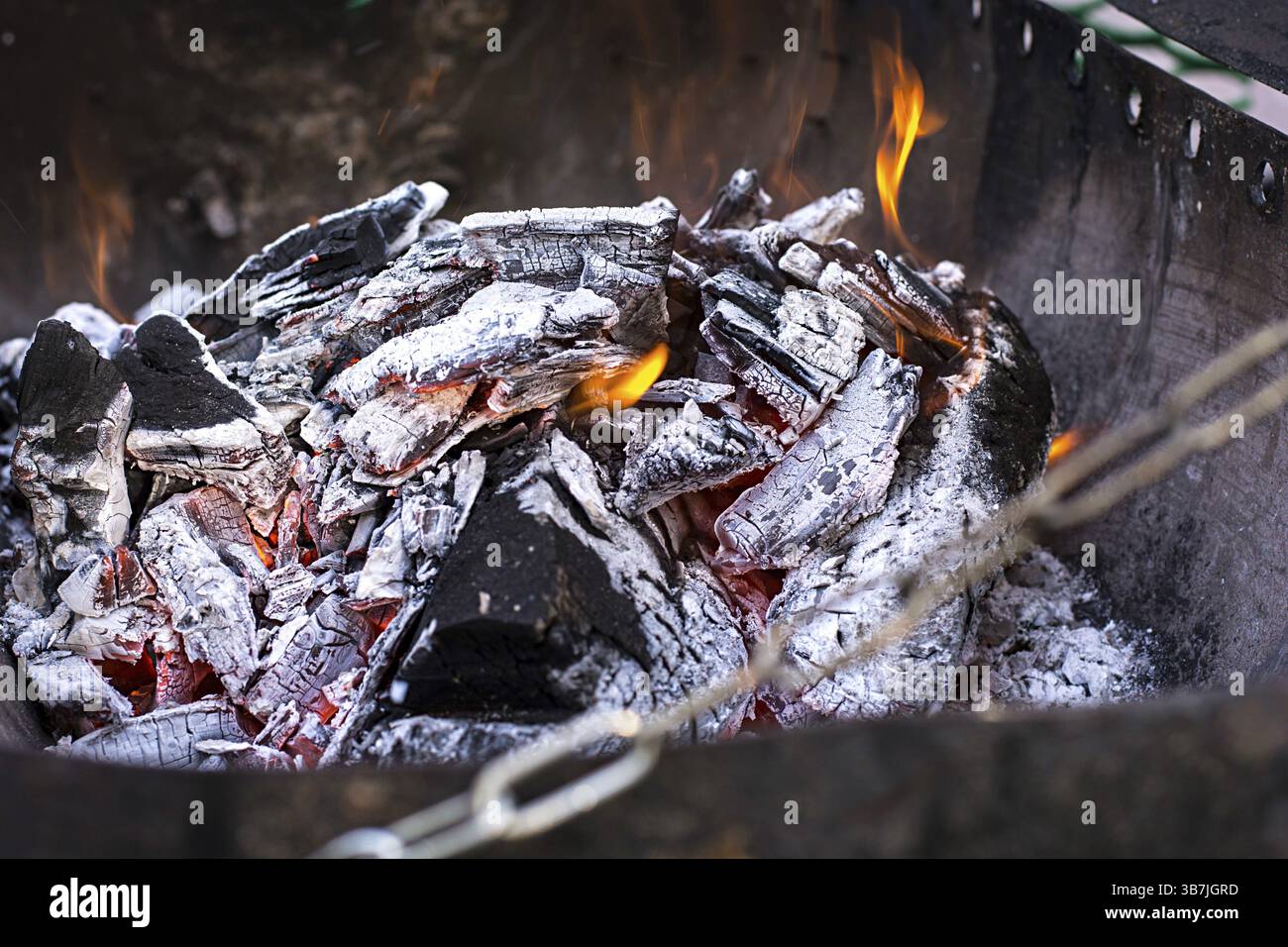 Improvised brazier with burning wood in it.selective focus Stock Photo ...