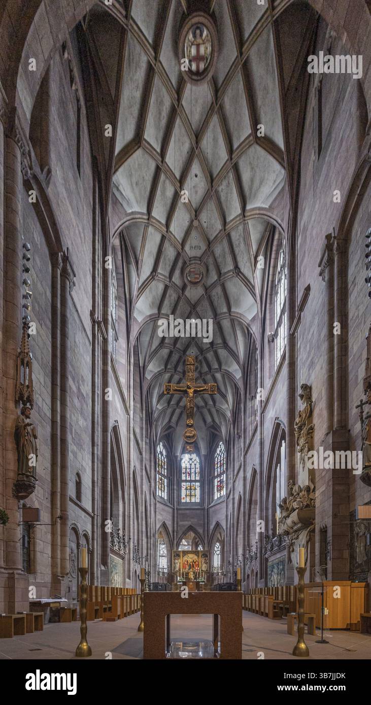 An impressive church interior with Gothic vaulting and cruciform altar ...