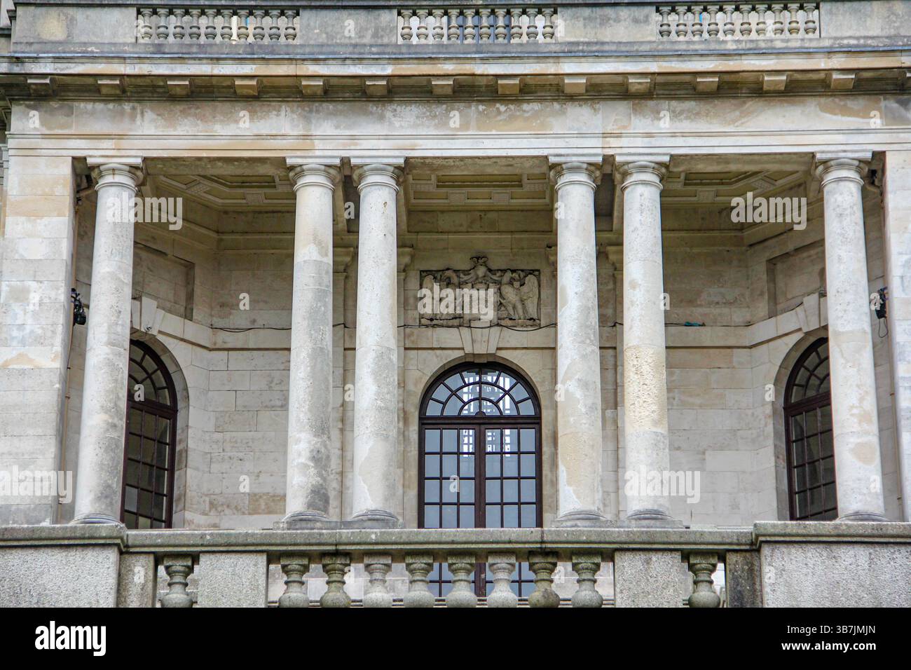 Stone pillars and arched windows, a fusion of classical and Edwardian ...