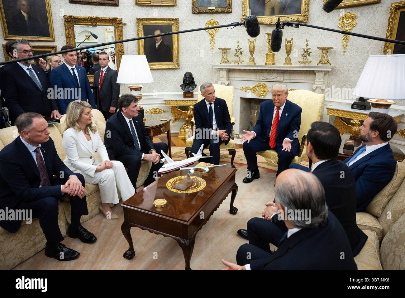 Canadian Prime Minister Mark Carney meets with U.S. President Donald Trump in the Oval Office at ...